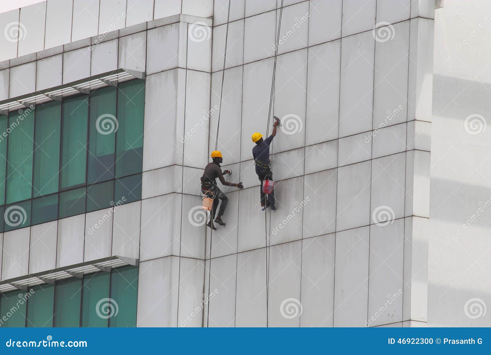 Workers Cleaning or Painting a Multistory Building Editorial Image ...