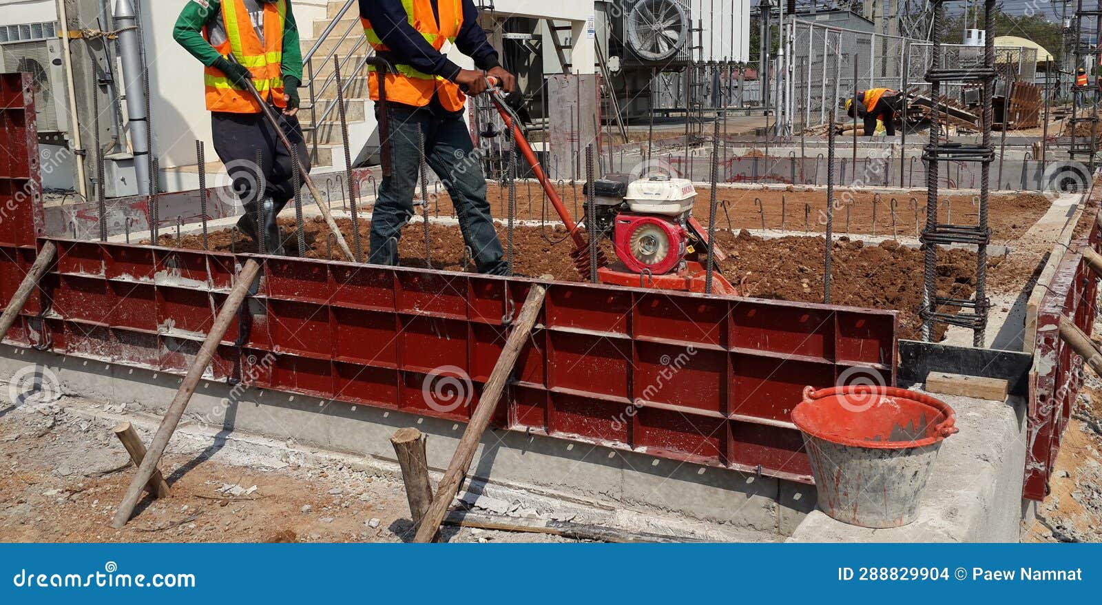 Workers are Compacting the Soil Editorial Stock Image - Image of gravel ...