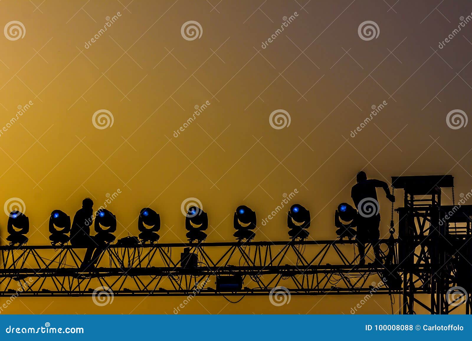 Workers on Concert Structure in the Sunset Backlight Stock Photo ...
