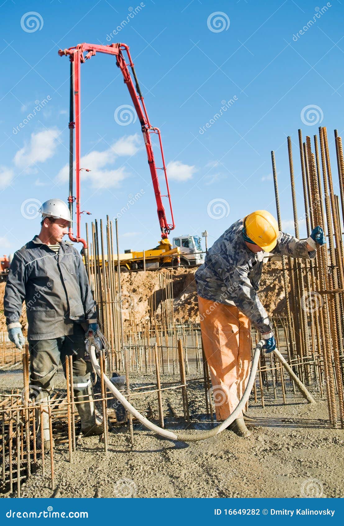 Workers on concrete works stock photo. Image of aiming - 16649282