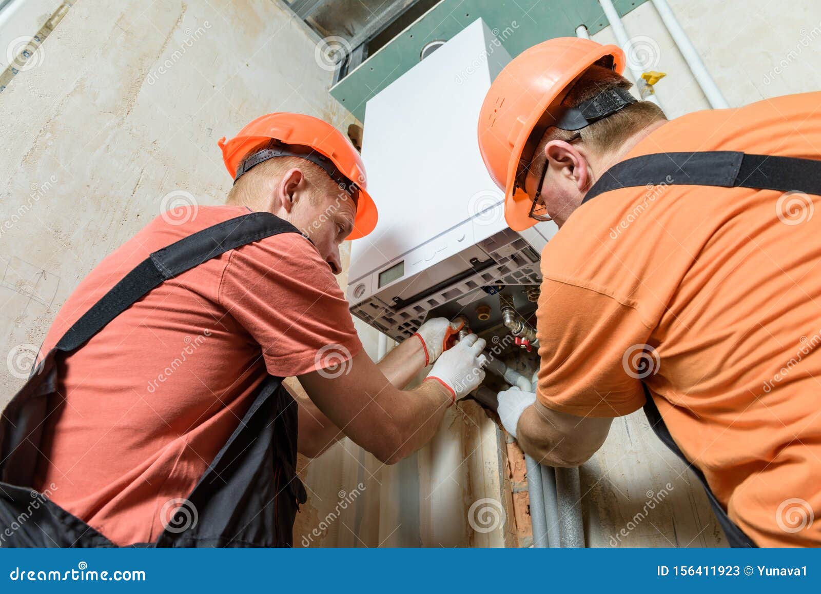 Workers are Connecting the Pipes To the Gas Boiler Stock Image - Image ...