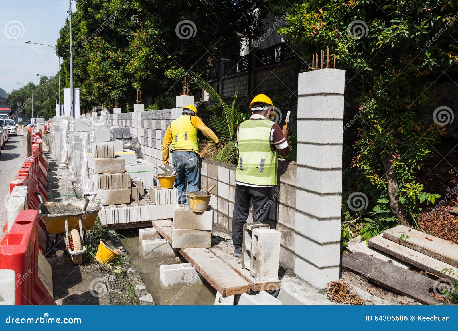 Workers Constructing Building Noise Barrier Walls at Busy Highway ...