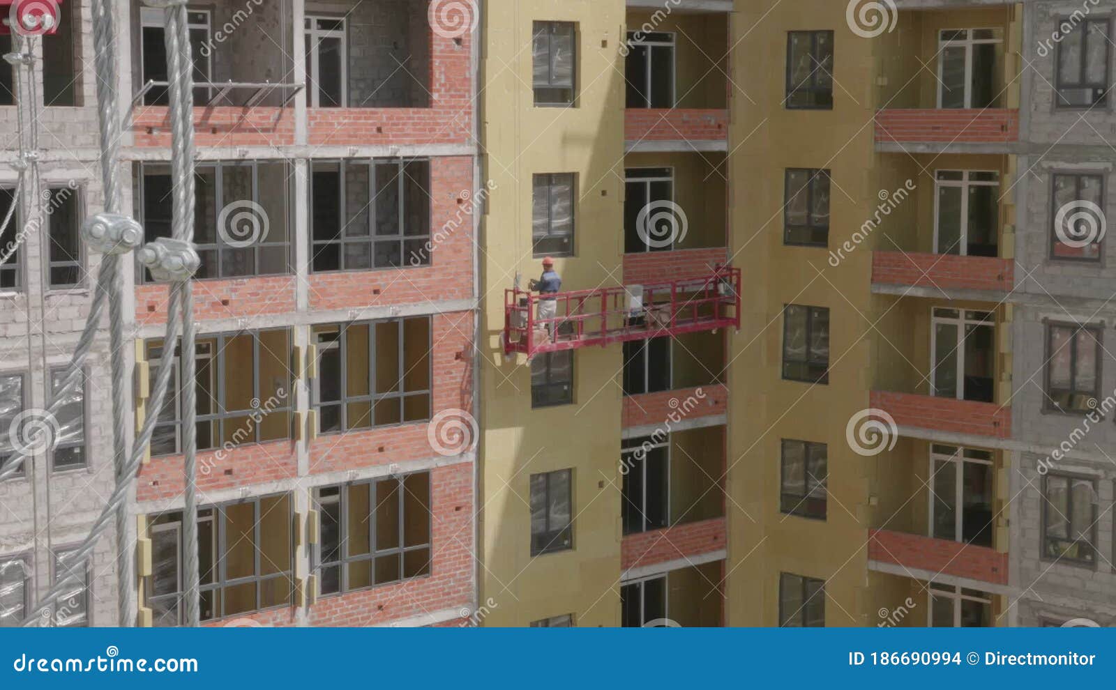Workers in the Construction Cradle Make Cladding Stock Footage - Video ...