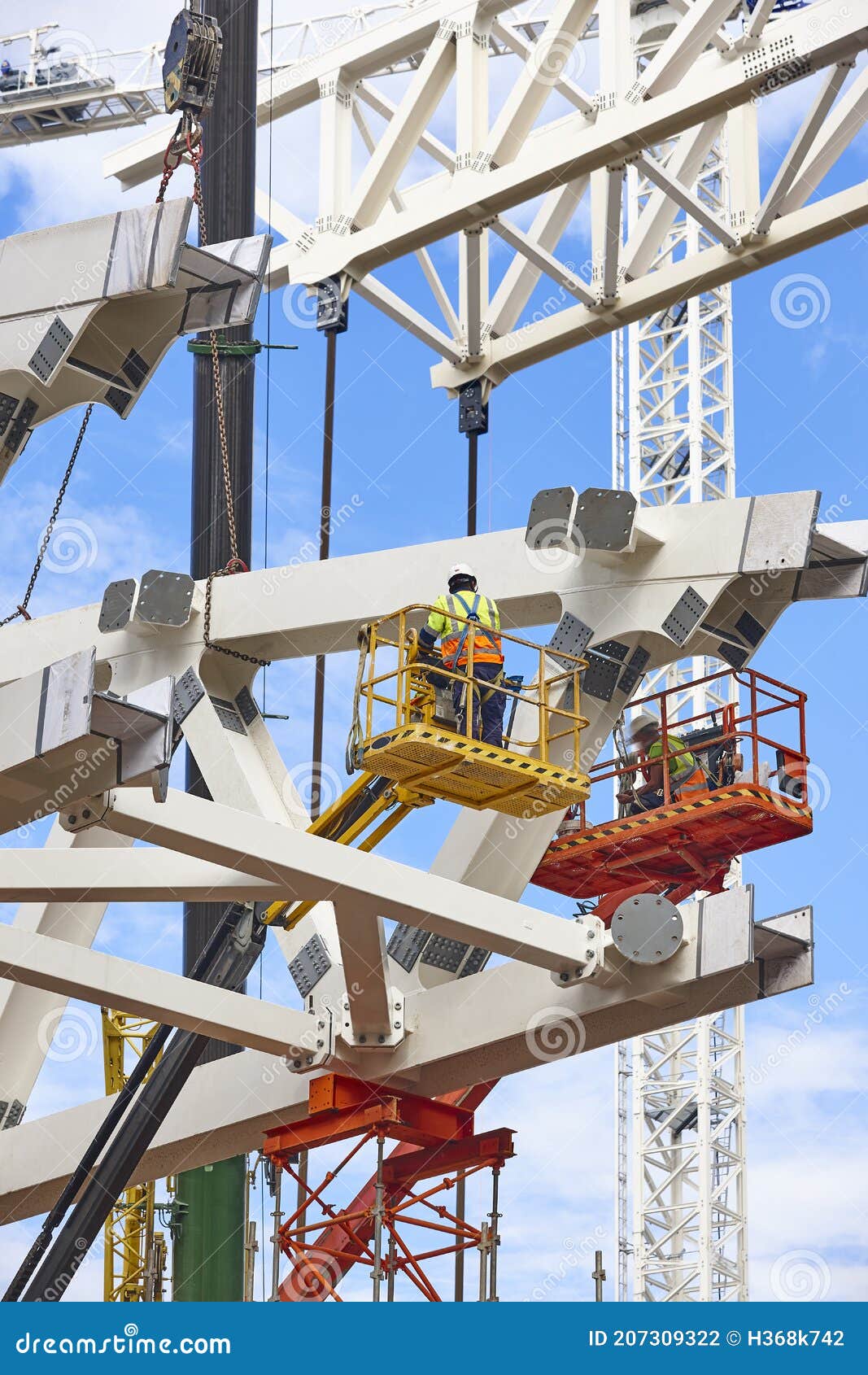 Workers on a Construction Site. Engineering and Architectural ...