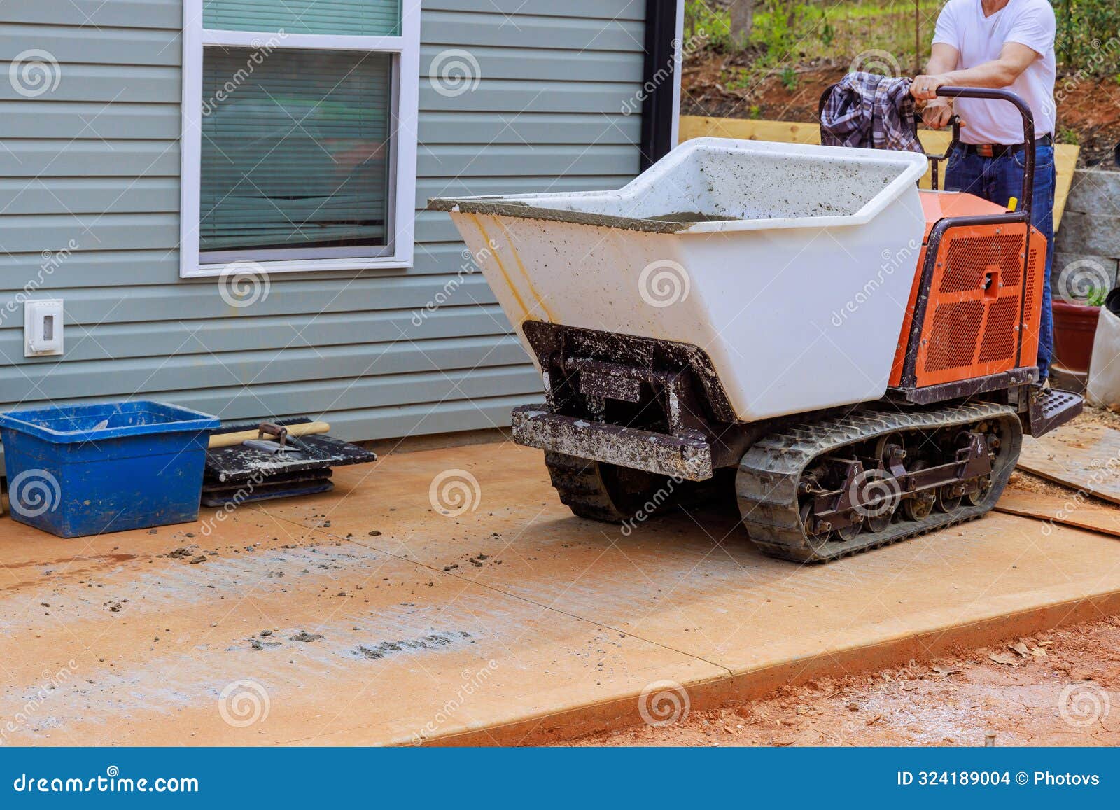 Workers at Construction Site Use a Dumper Tracked Wheelbarrow when ...
