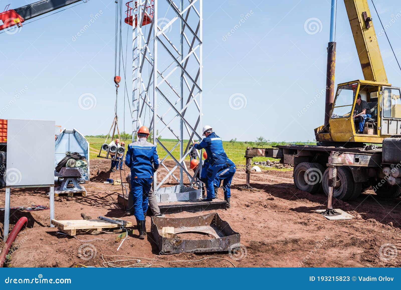 Workers at a Construction Site are Using Construction Equipment To ...