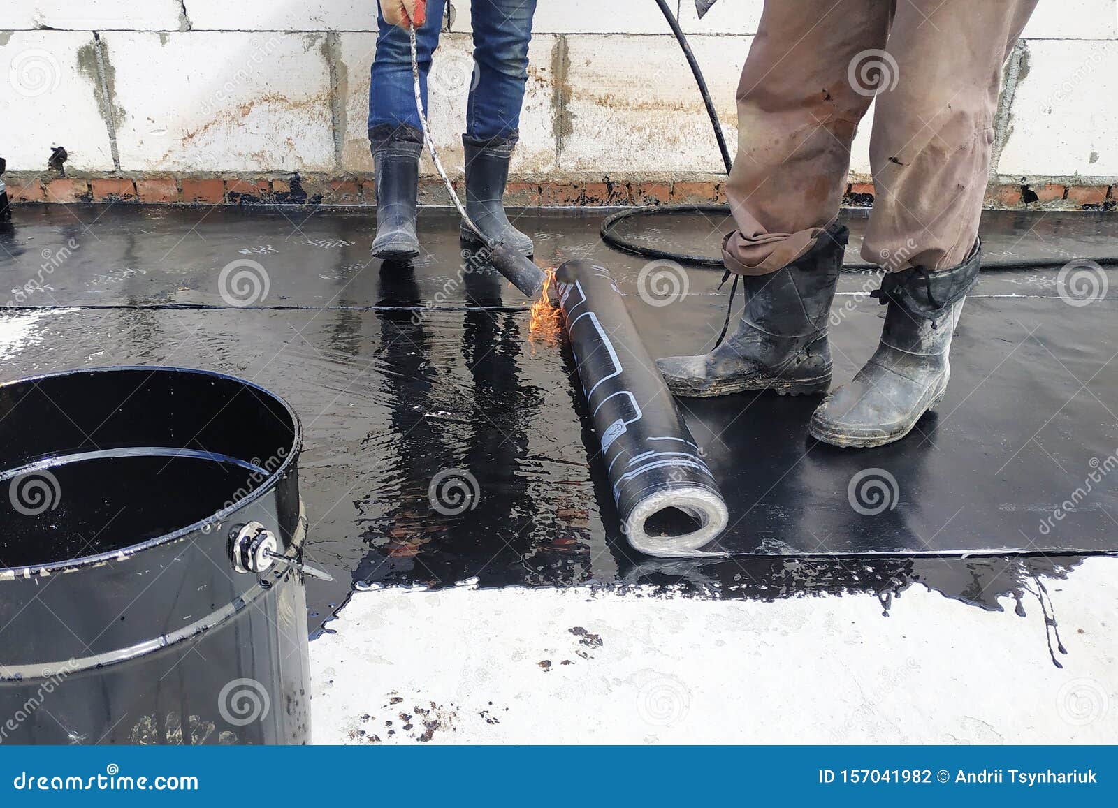 The Workers Cover the Concrete Screed with Bituminous Liquid Solution ...