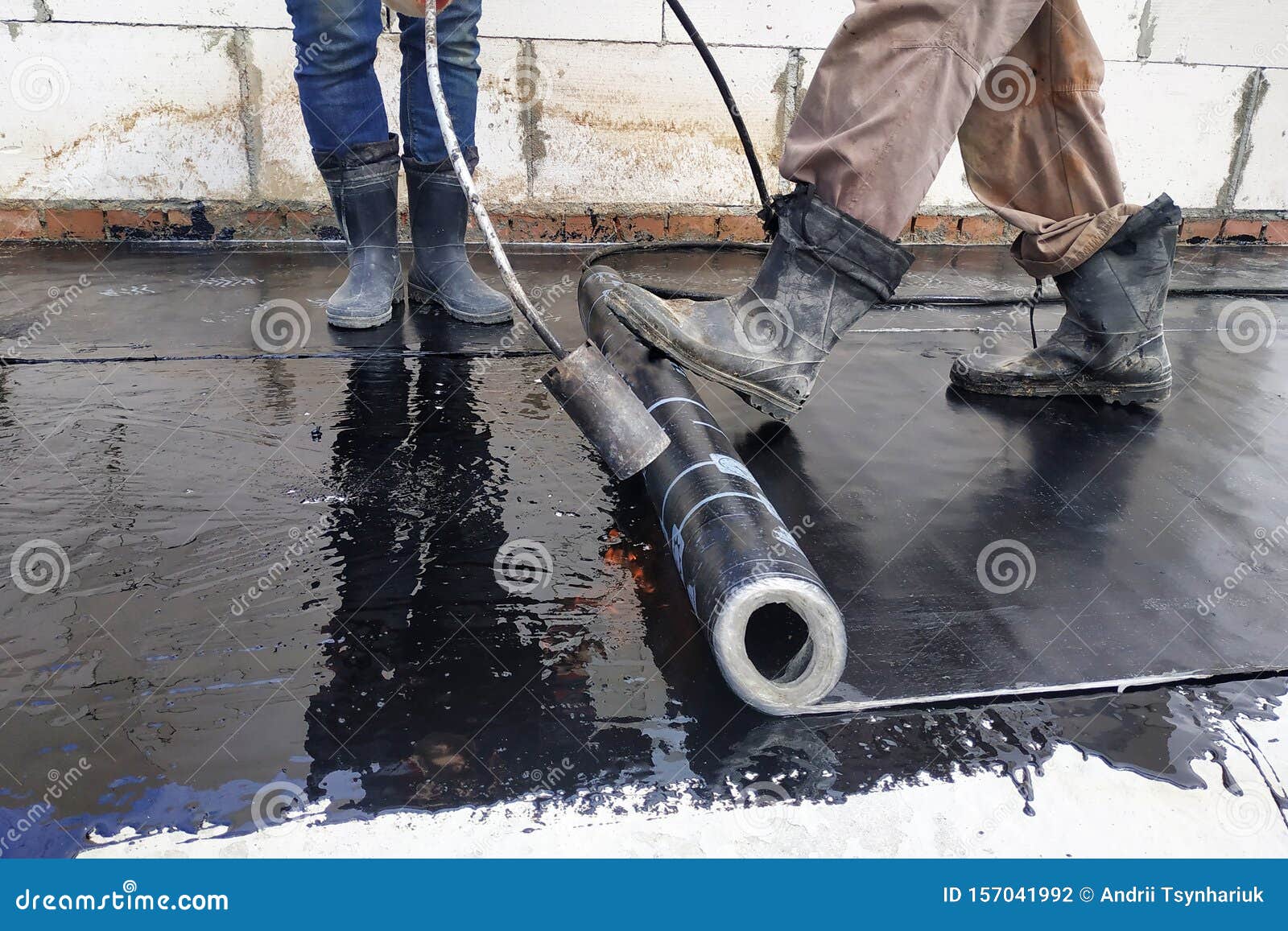 The Workers Cover the Concrete Screed with Bituminous Liquid Solution ...