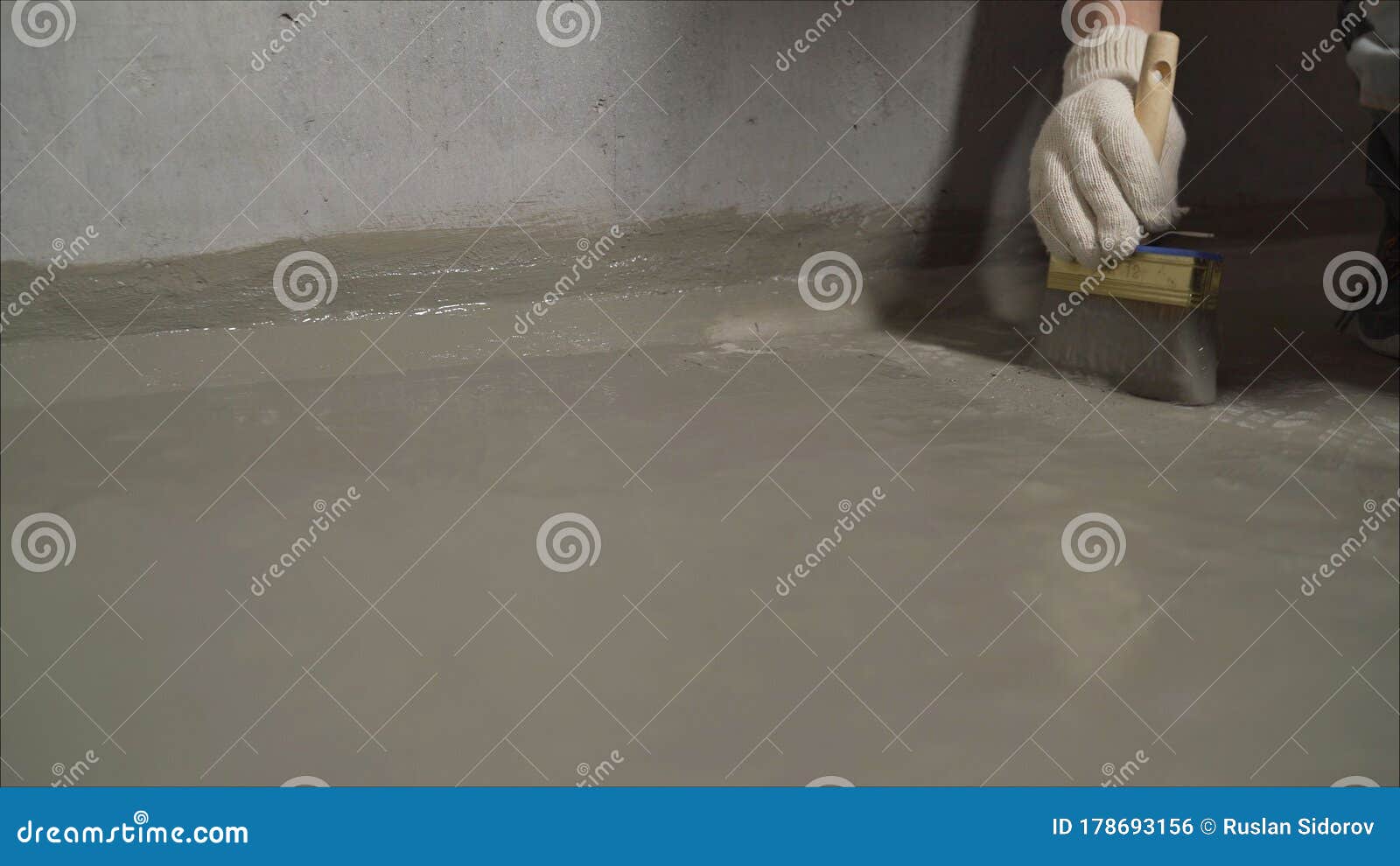 Workers Cover the Concrete Screed with Mortar and Make Waterproofing ...
