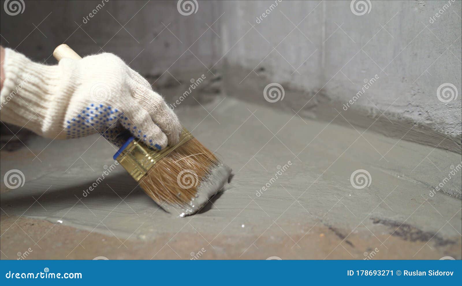 Workers Cover the Concrete Screed with Mortar and Make Waterproofing ...