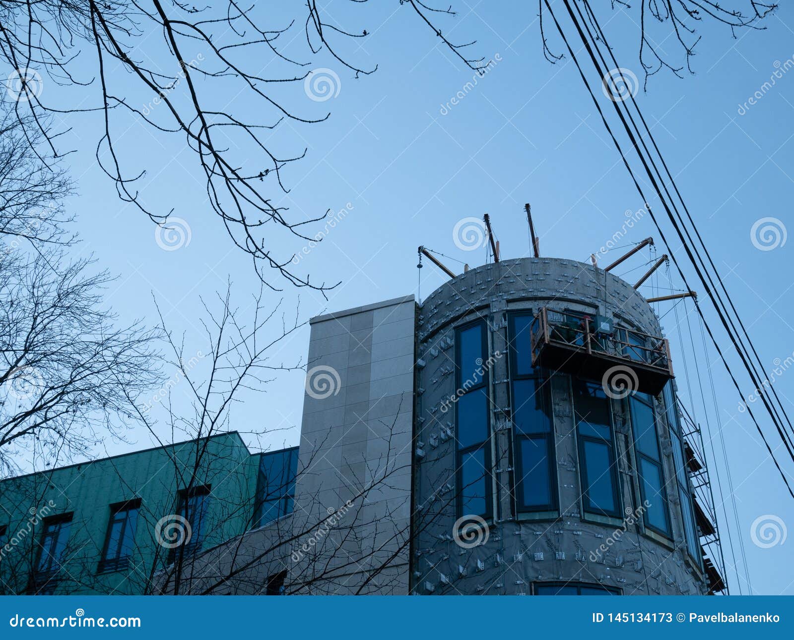 Workers Cradle Hanging in Front of Reconstructed Office Building Stock ...