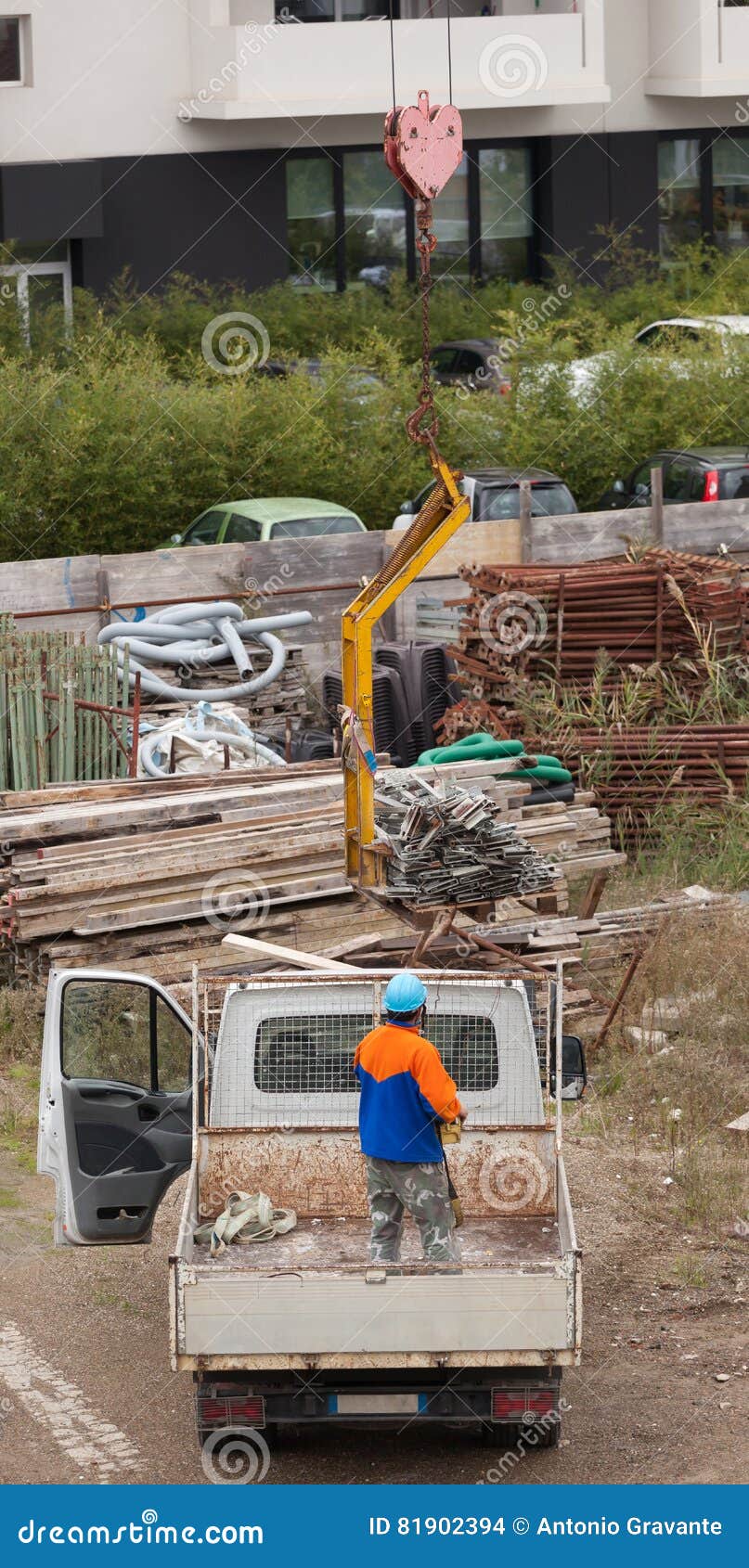 Workers with the Crane Moving Steel. Stock Photo - Image of crane ...