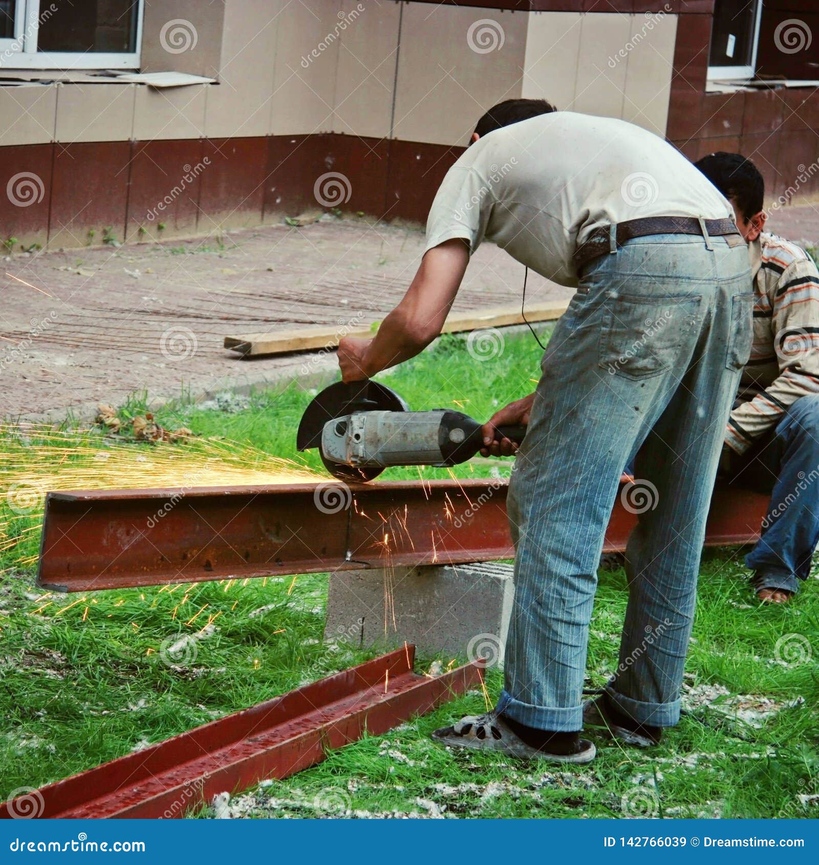 Workers cut metal editorial stock image. Image of house - 142766039