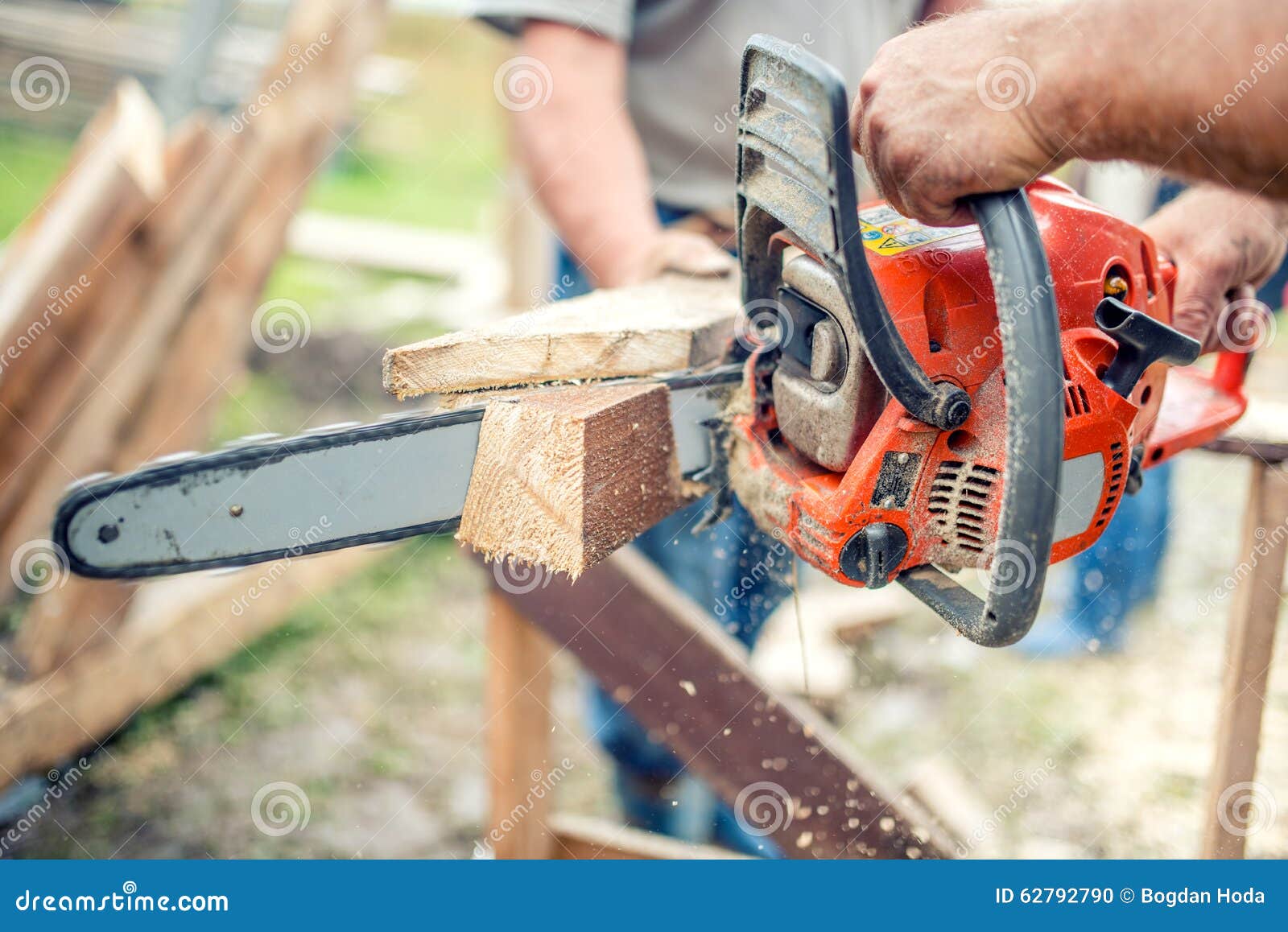 Workers Cutting Timber Wood with Chainsaw. Men Sawing Using Electrical ...