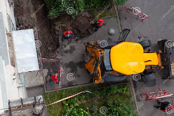 Workers Digging and Pulling the Fiber Optic Cable Stock Image - Image ...