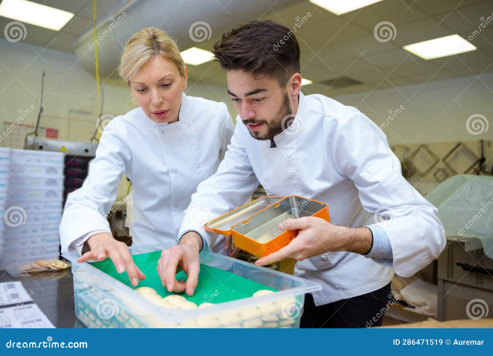 Workers in Discussion by Storage Tanks in Chocolate Factory Stock Image ...