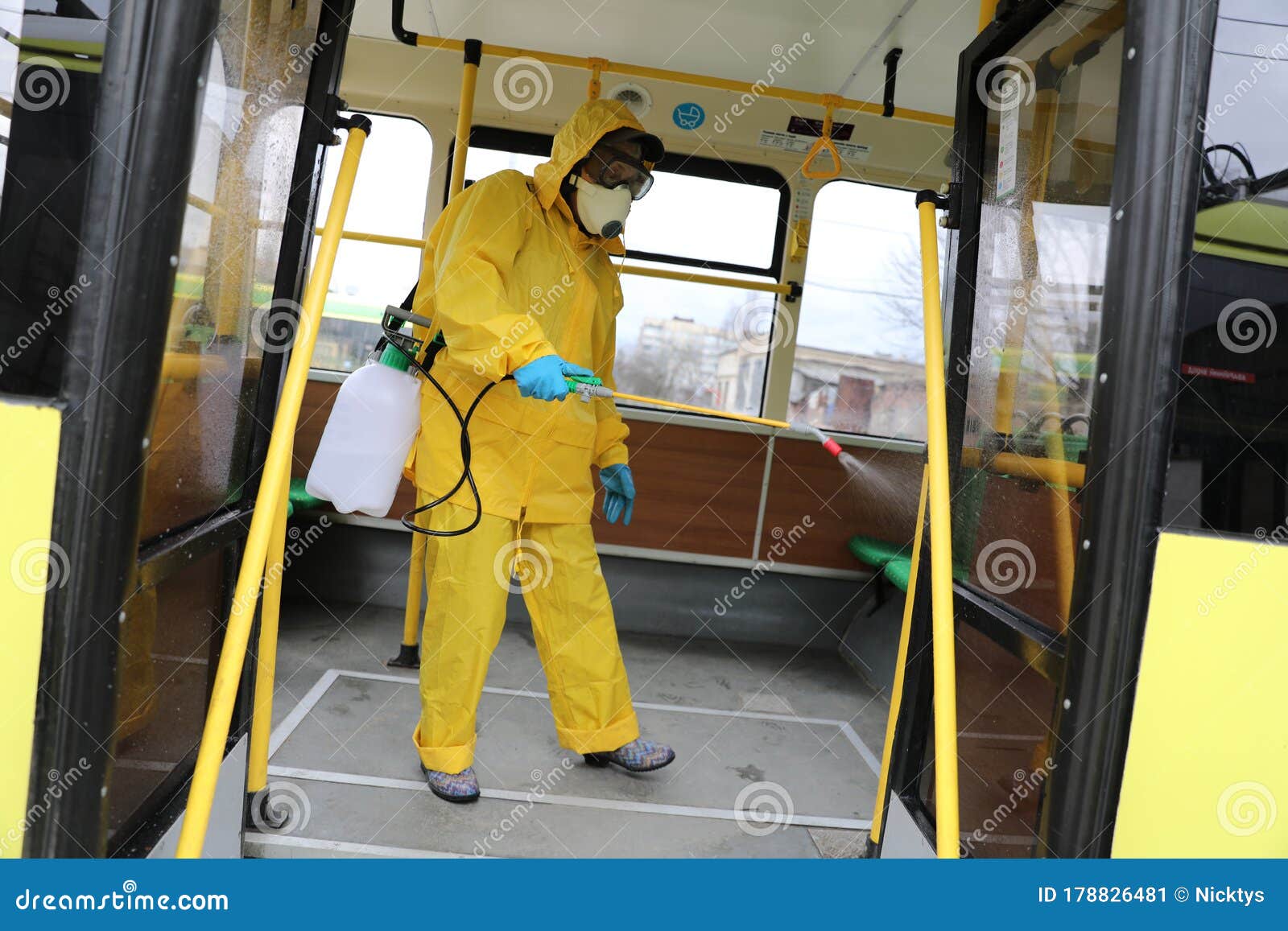 Workers disinfecting bus editorial photo. Image of indoors - 178826481