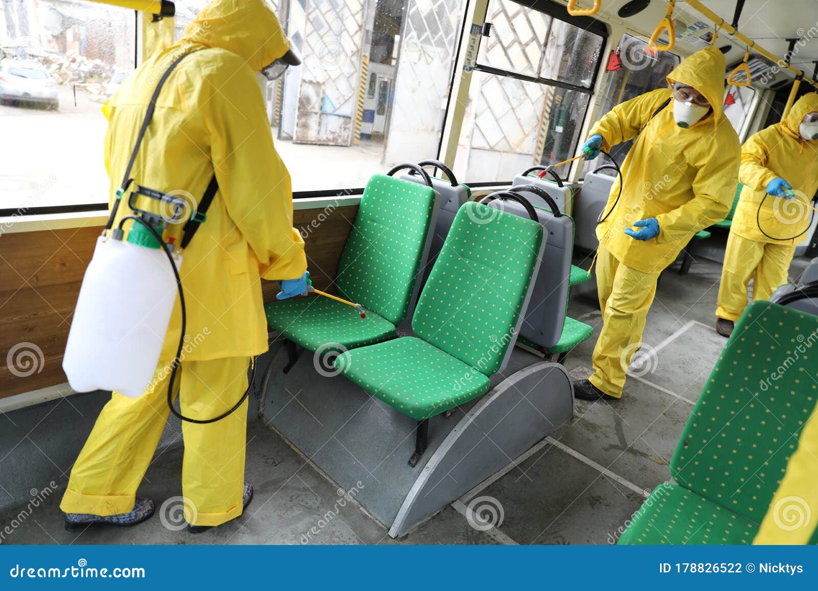 Workers disinfecting bus editorial photography. Image of hazmat - 178826522