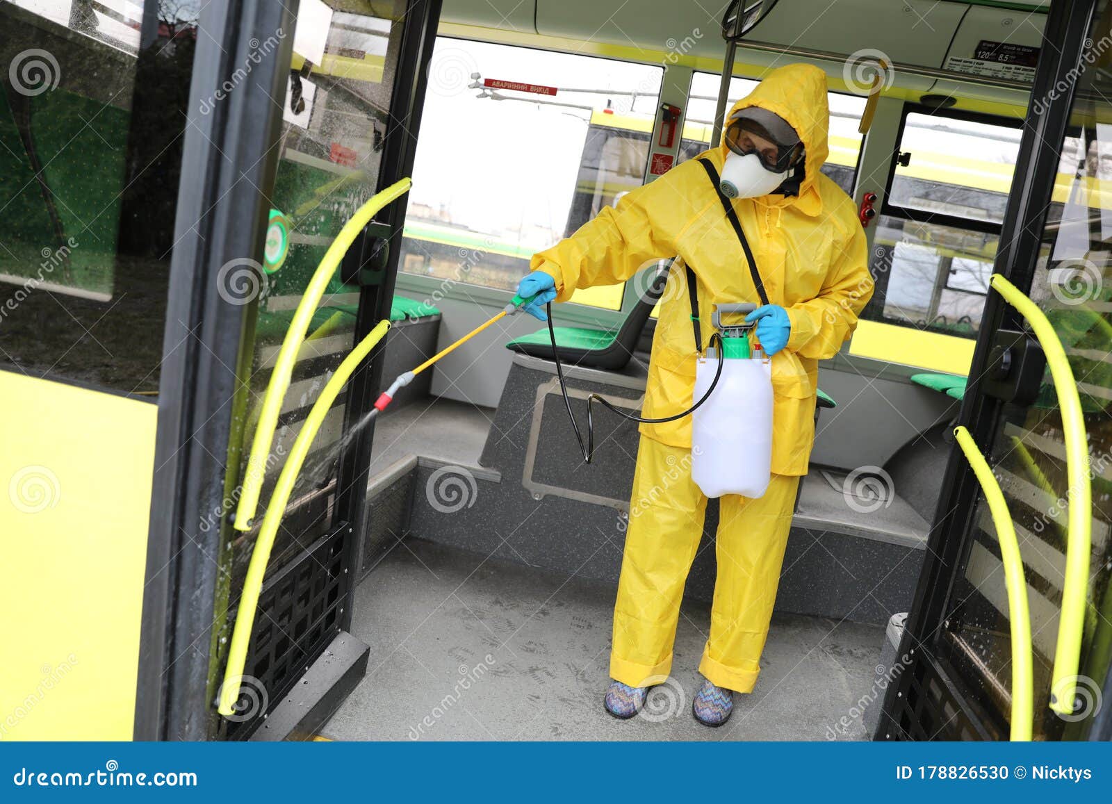 Workers disinfecting bus editorial image. Image of contamination ...