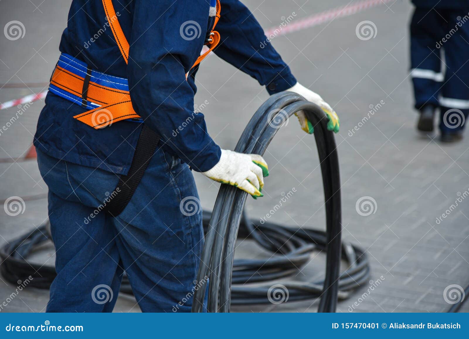 Workers Dismantle the Telecommunication Cable in the Well Stock Image ...