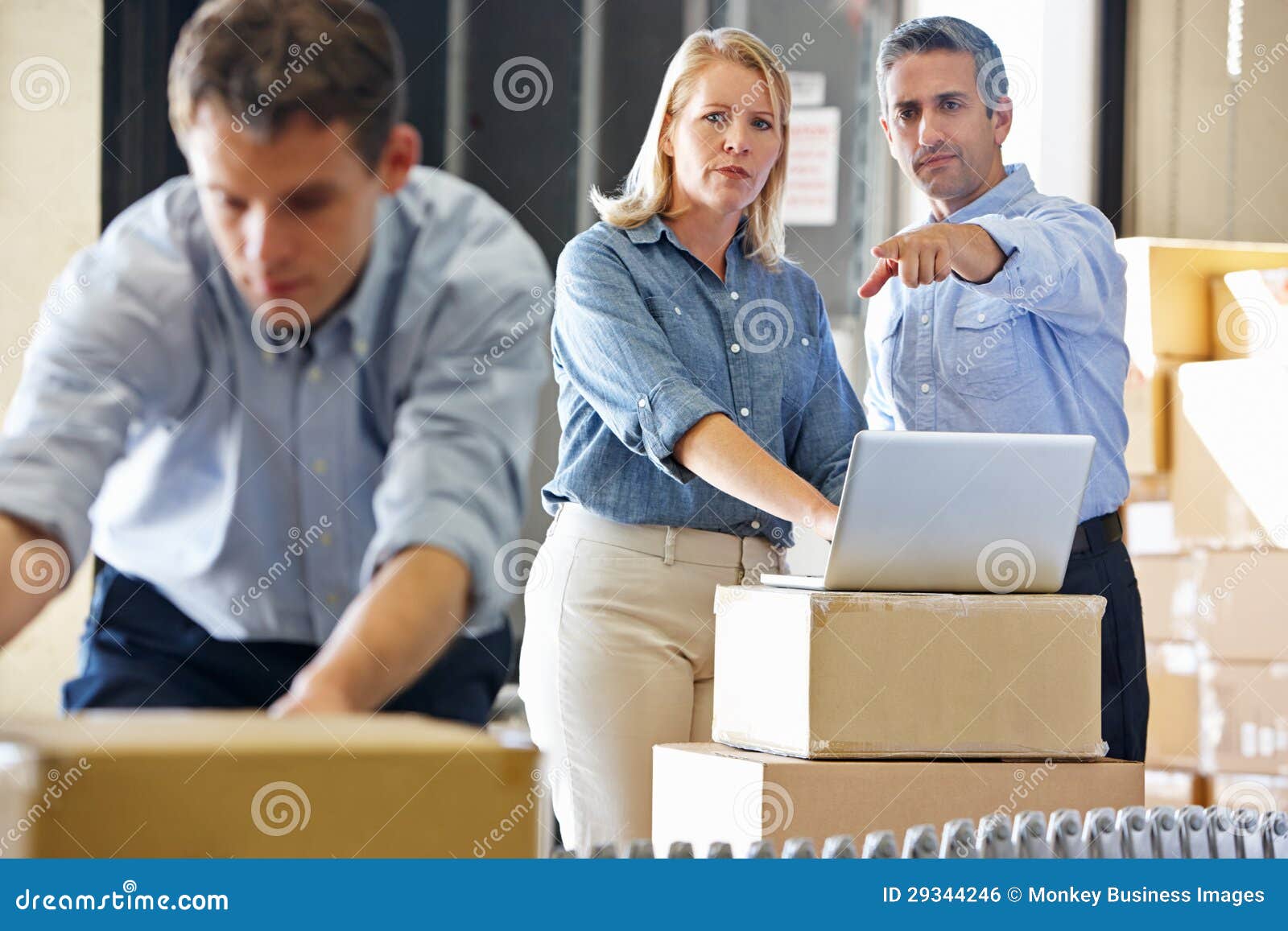 Workers in Distribution Warehouse Stock Photo - Image of discussion ...
