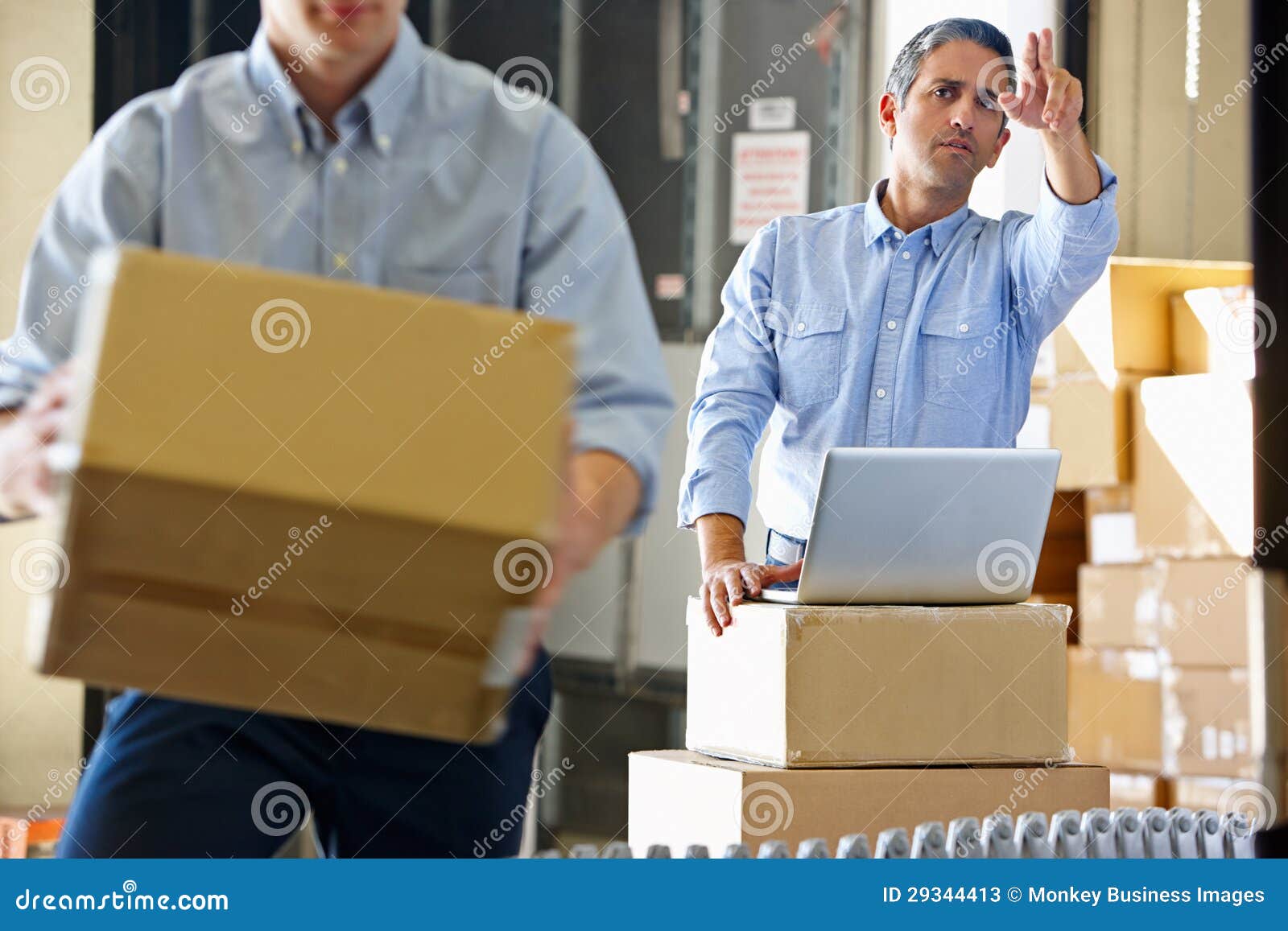 Workers in Distribution Warehouse Stock Image - Image of male, shipping ...