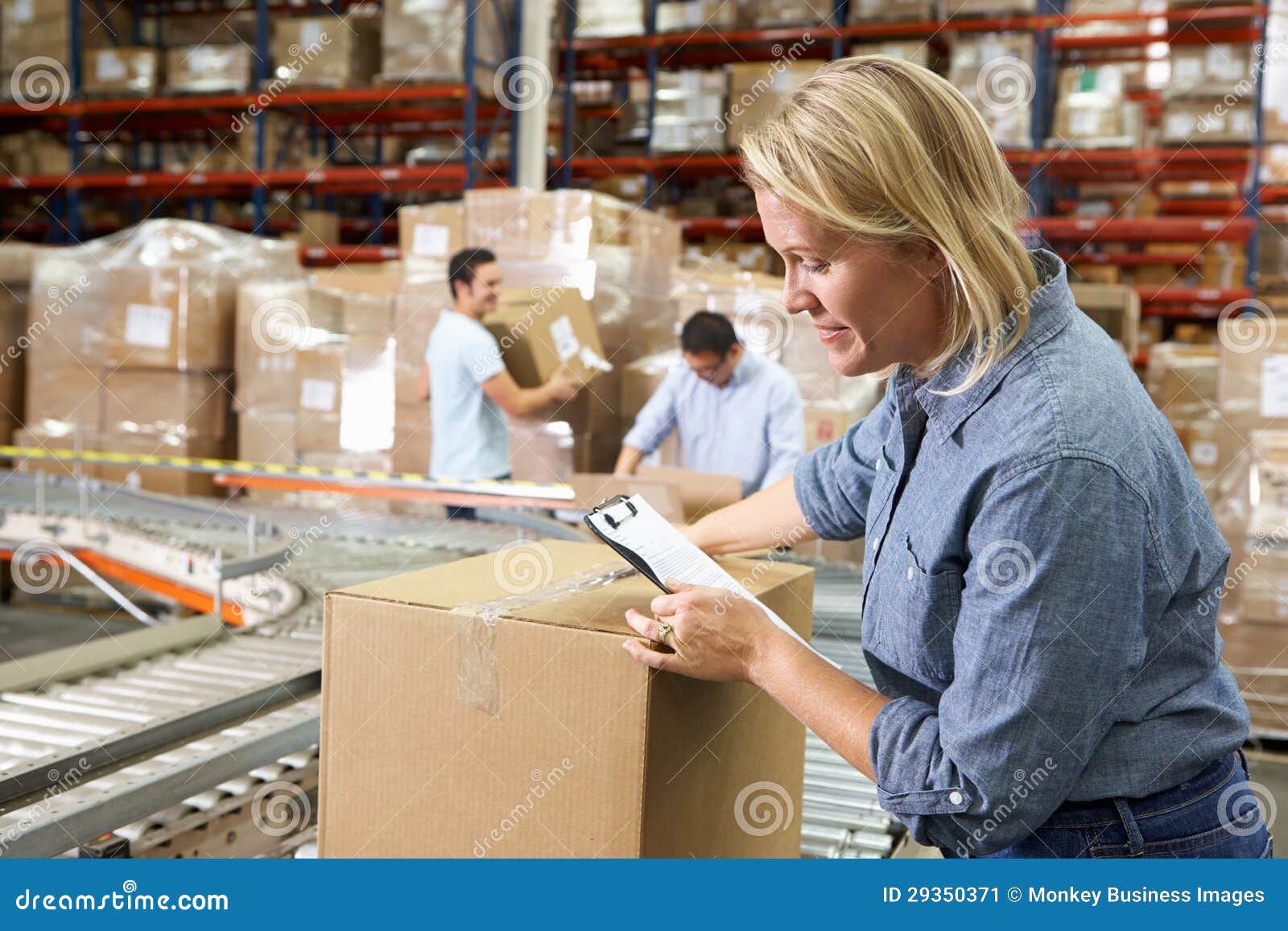 Workers in Distribution Warehouse Stock Image - Image of laptop ...