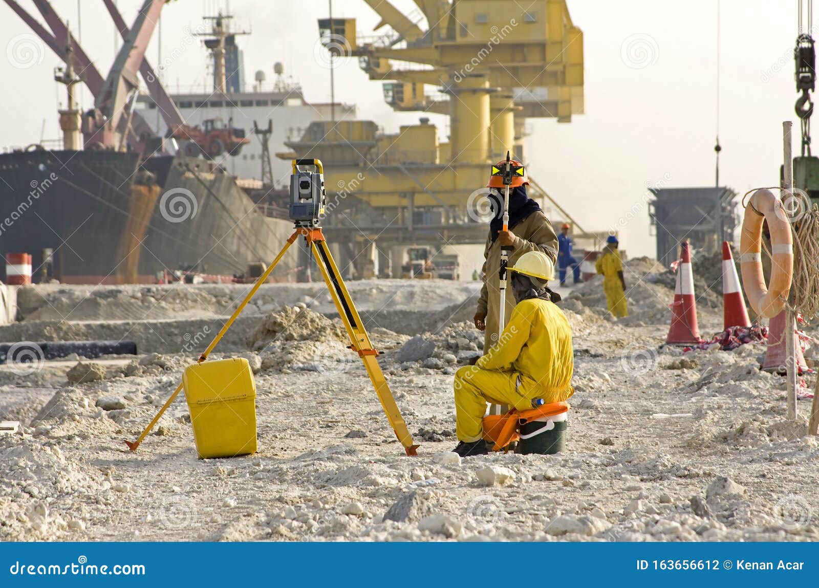 Workers Doing Measurement at the Construction Site. Stock Photo - Image ...
