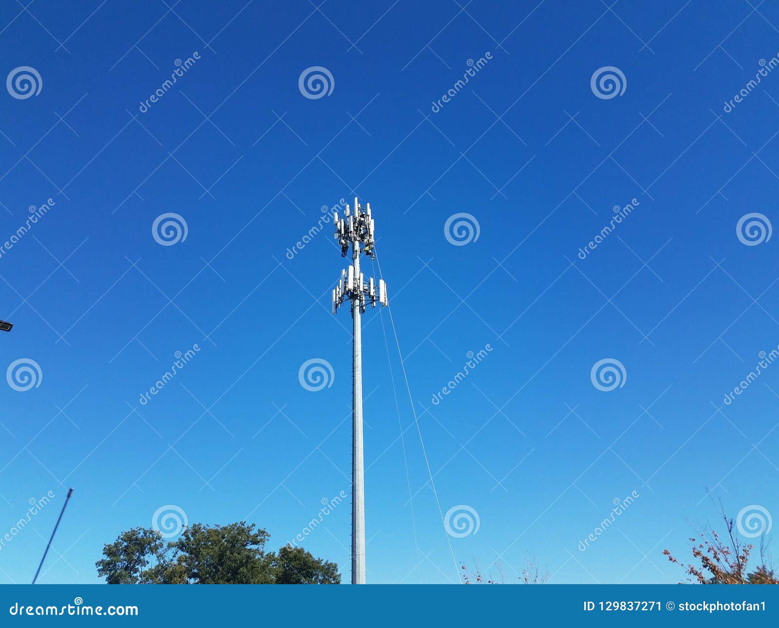 Workers Doing Repairs on a Tall Tower with Ropes Stock Image - Image of ...