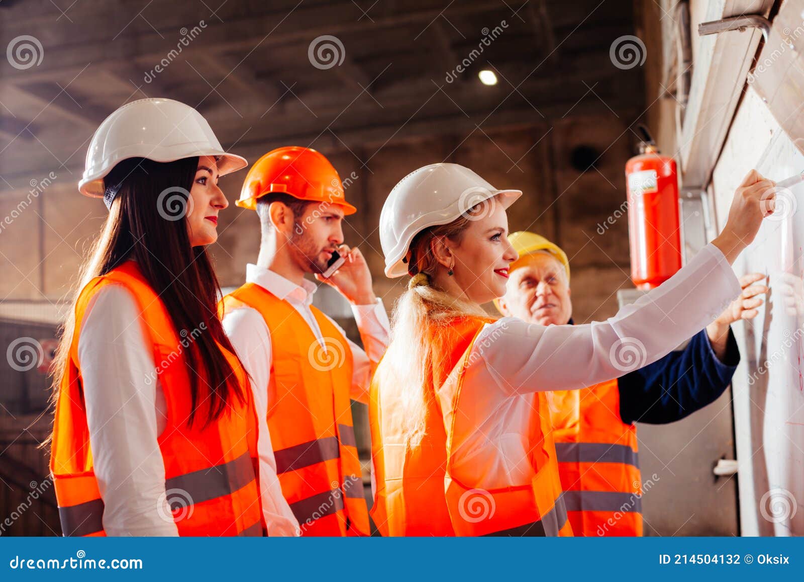 The Workers Draw Up a Plan of Work at the Plant Stock Photo - Image of ...