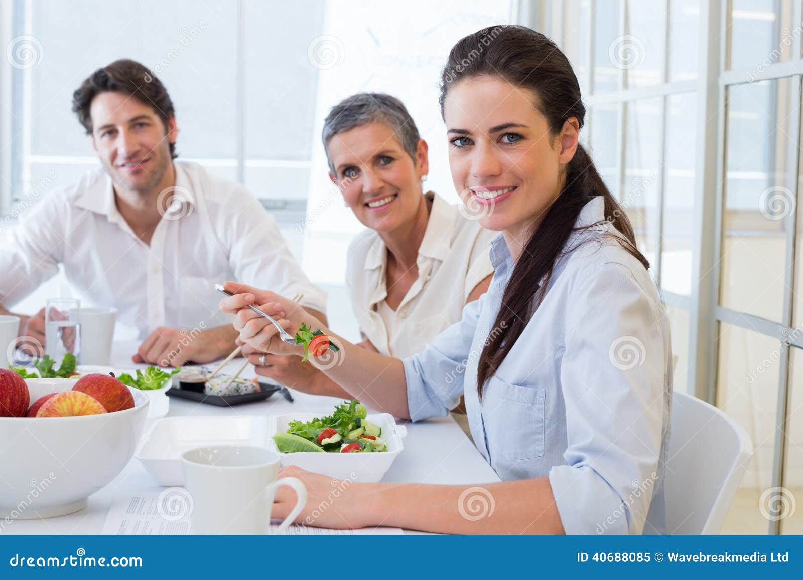 Workers Eating Lunch Smile at Camera Stock Image - Image of indoors ...