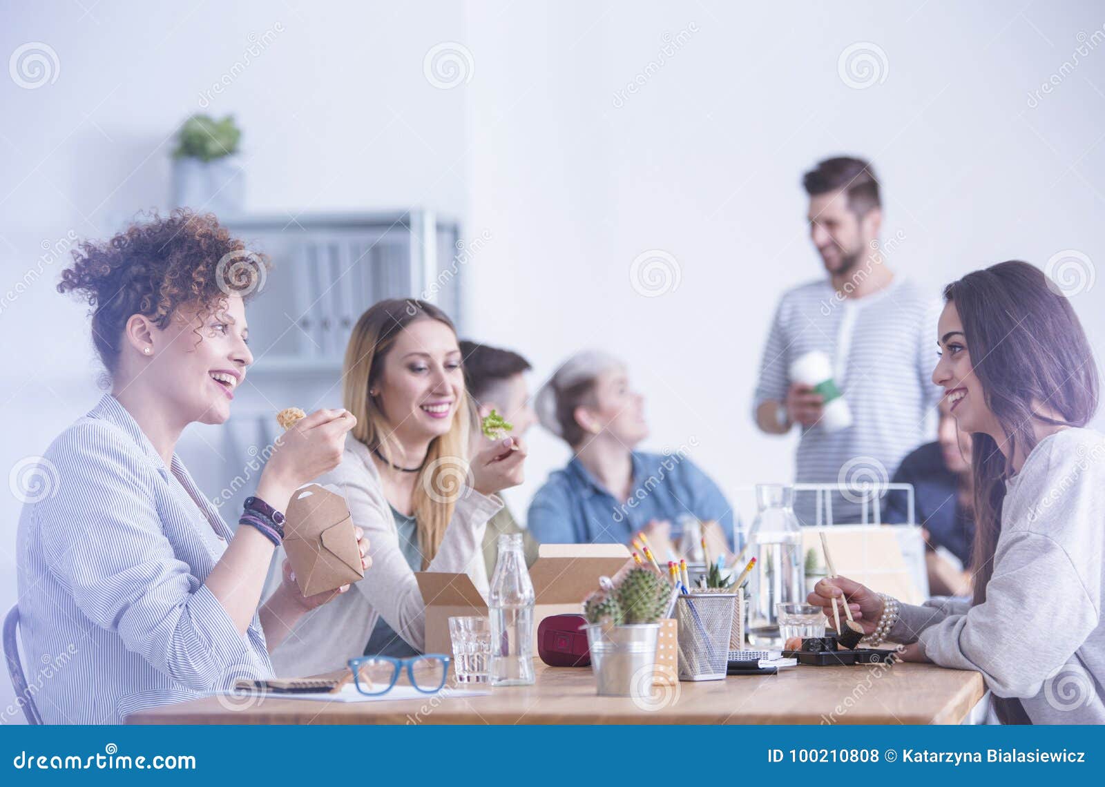 Workers Eating at the Office Stock Photo - Image of coworkers, company ...
