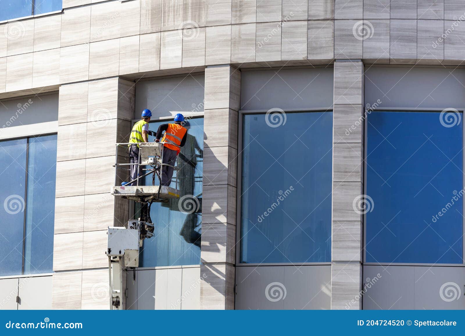 Workers in Elevated Platform Cleaning Building Window Glass Editorial ...