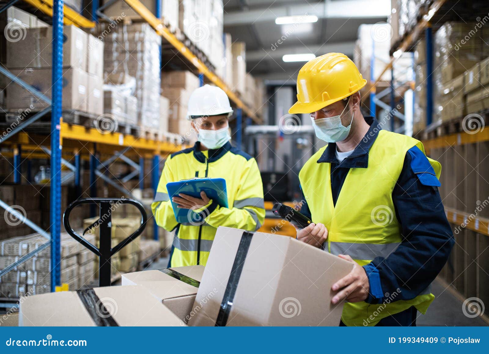 Workers with Face Mask Working Indoors in Warehouse, Coronavirus ...