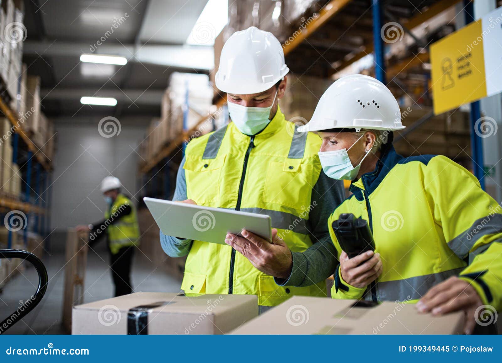 Workers with Face Mask Working Indoors in Warehouse, Coronavirus ...