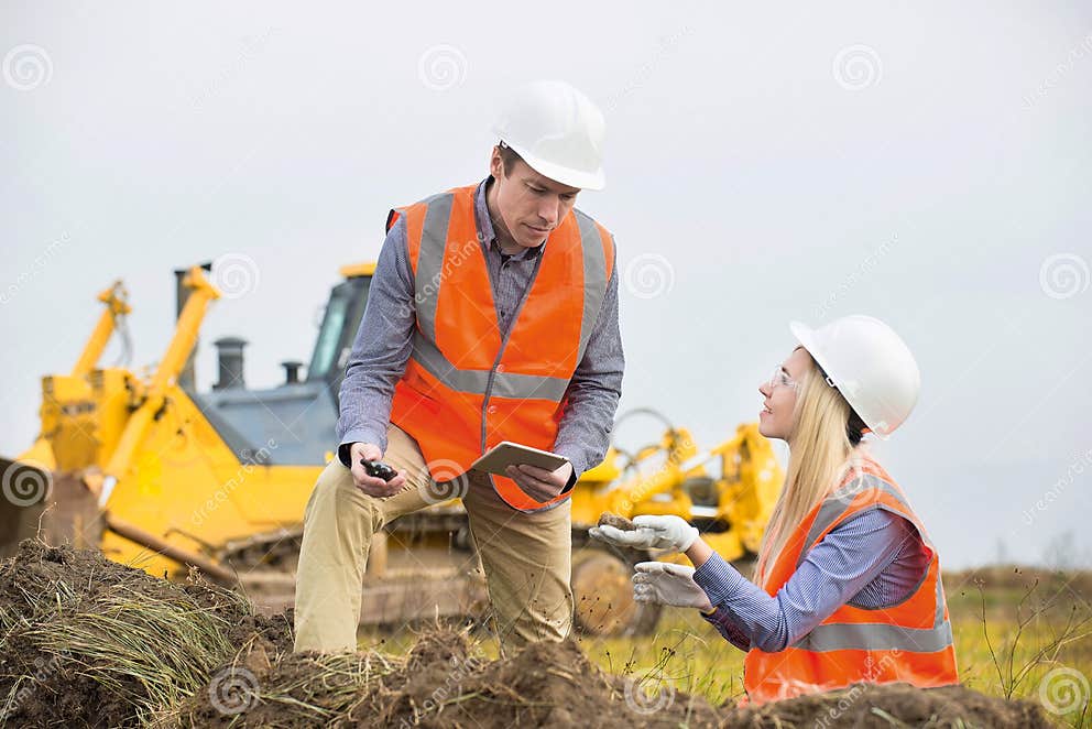 Workers in the field stock image. Image of industrial - 78201579