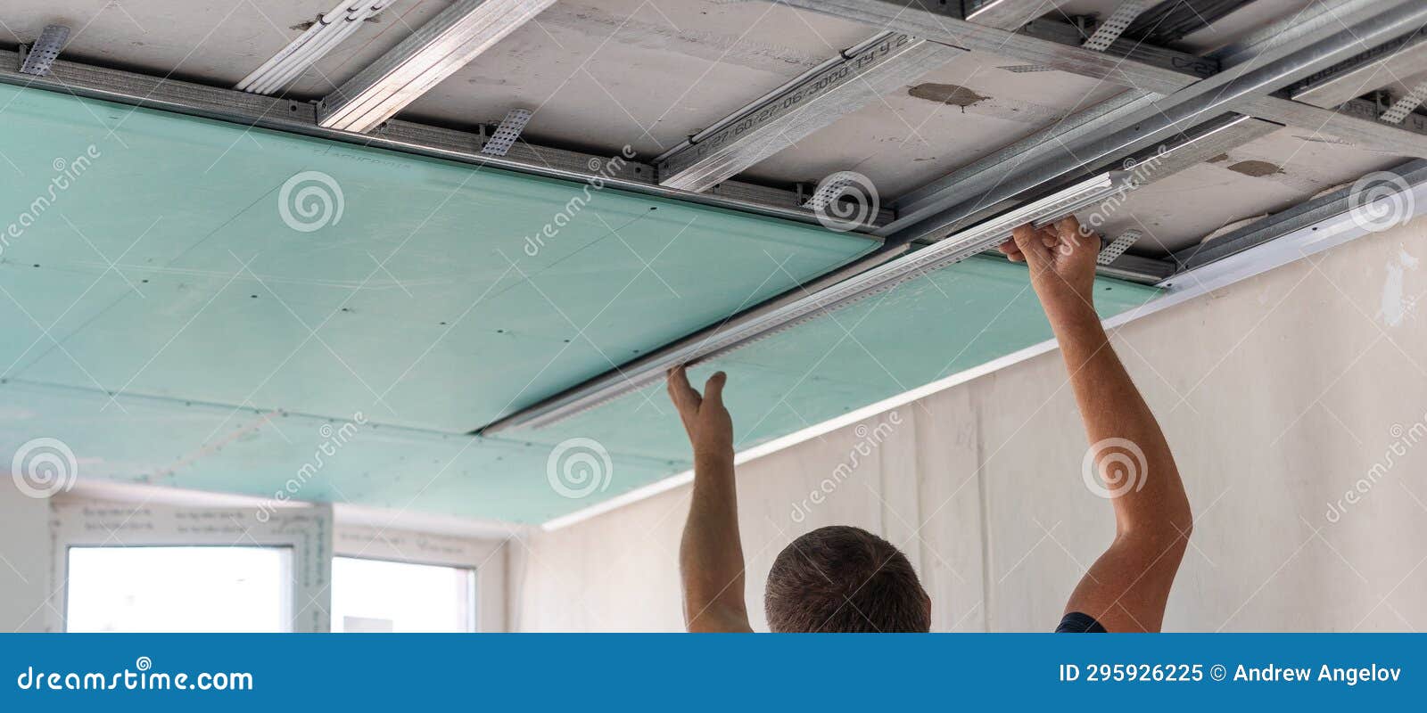 Workers Fitting Panel into Frame of Ceiling. Stock Image - Image of ...