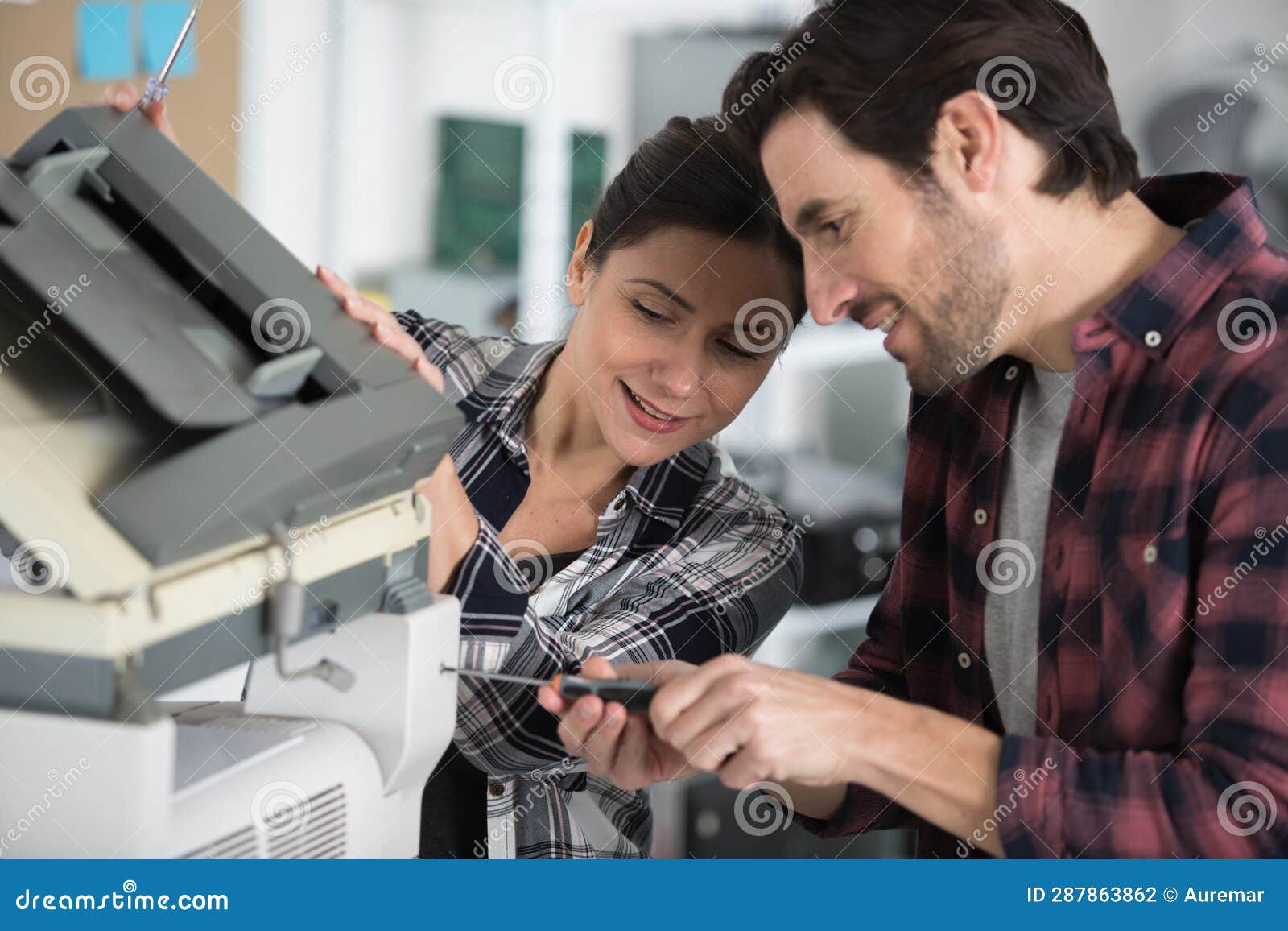 Workers Fixing Printer Together Stock Photo - Image of teamwork ...