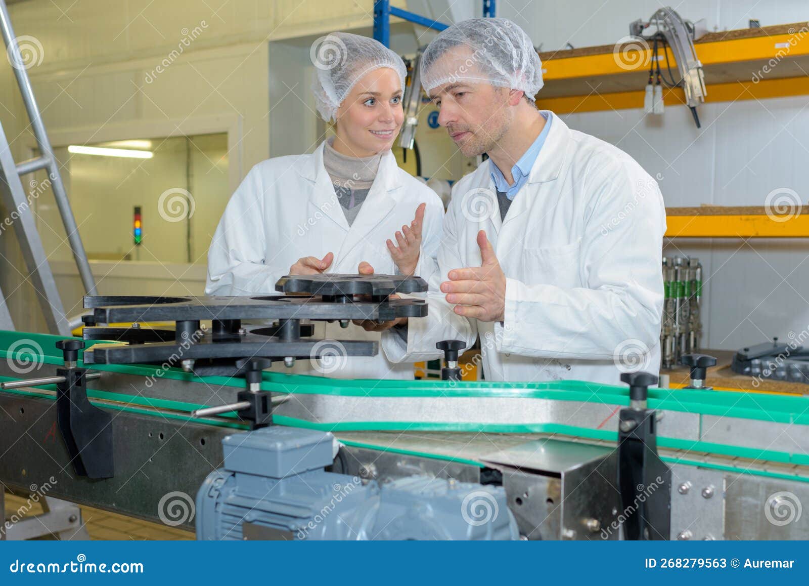 Workers in Food Production on Machine Stock Image - Image of workwear ...