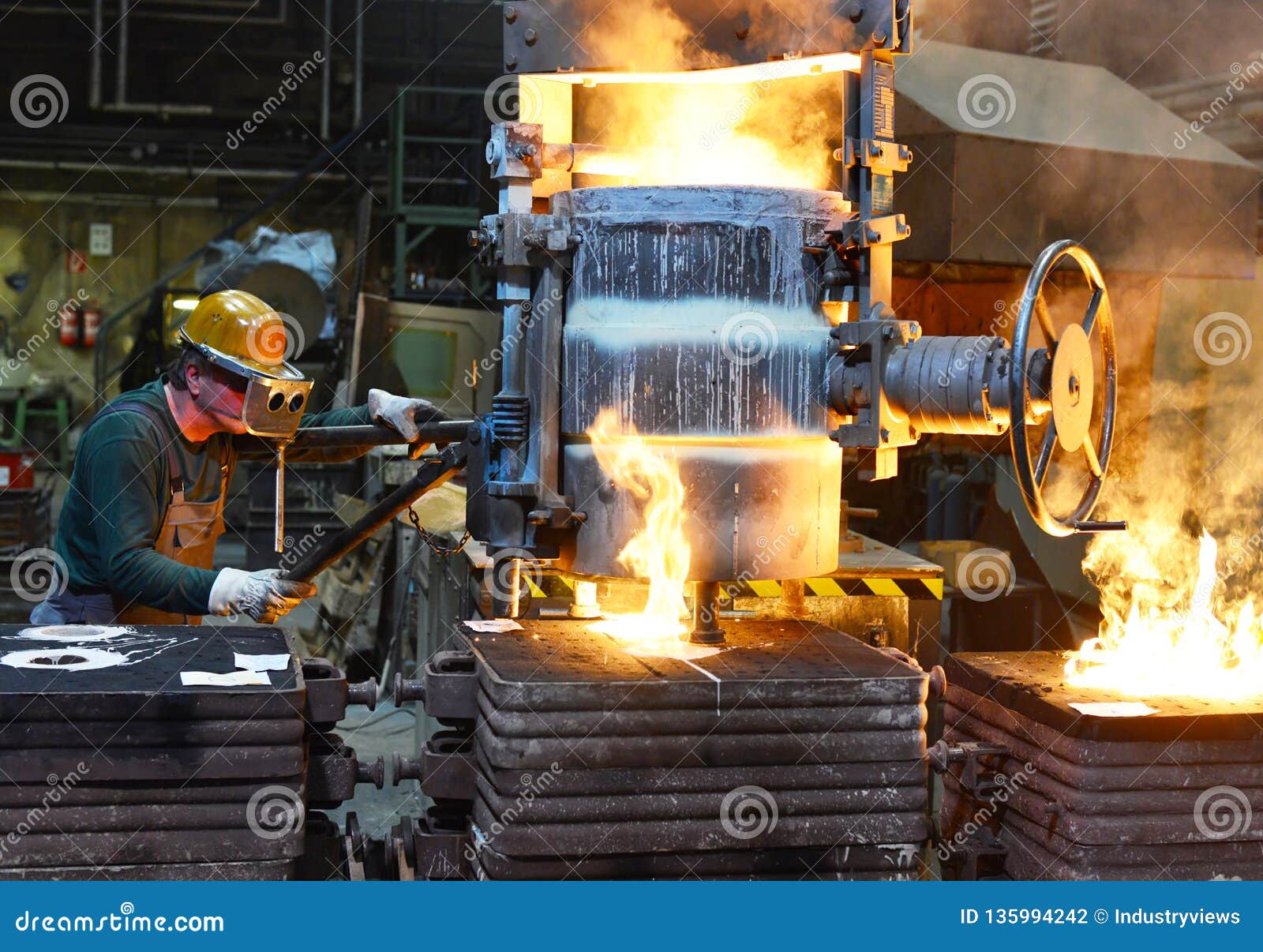 Workers in a Foundry Casting a Metal Workpiece - Safety at Work and ...