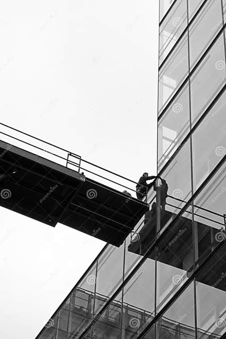 Workers at the Glass Storefront Stock Photo - Image of height, ramp ...