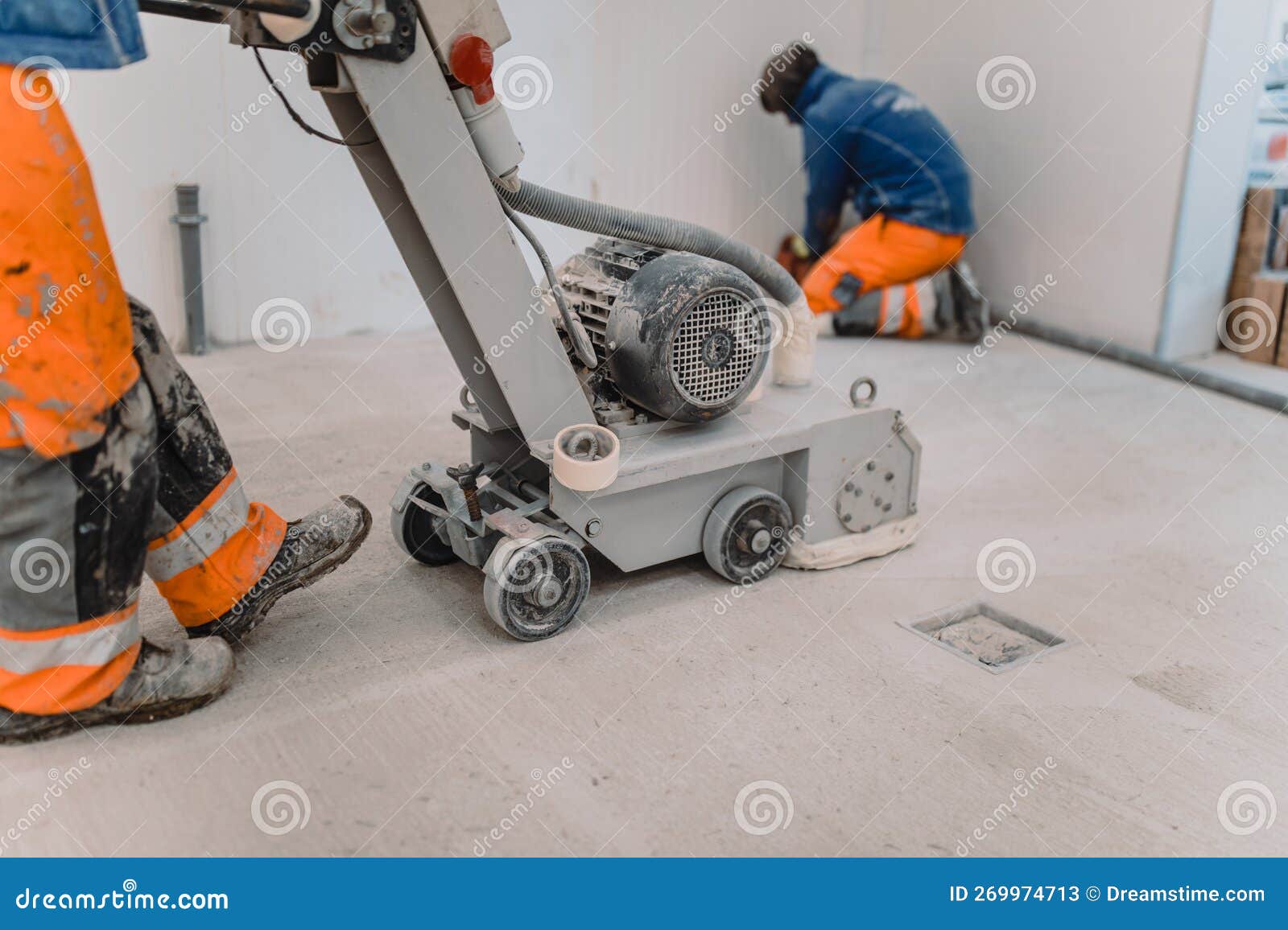 Workers Grind the Concrete Floor at the Construction Site Stock Image ...