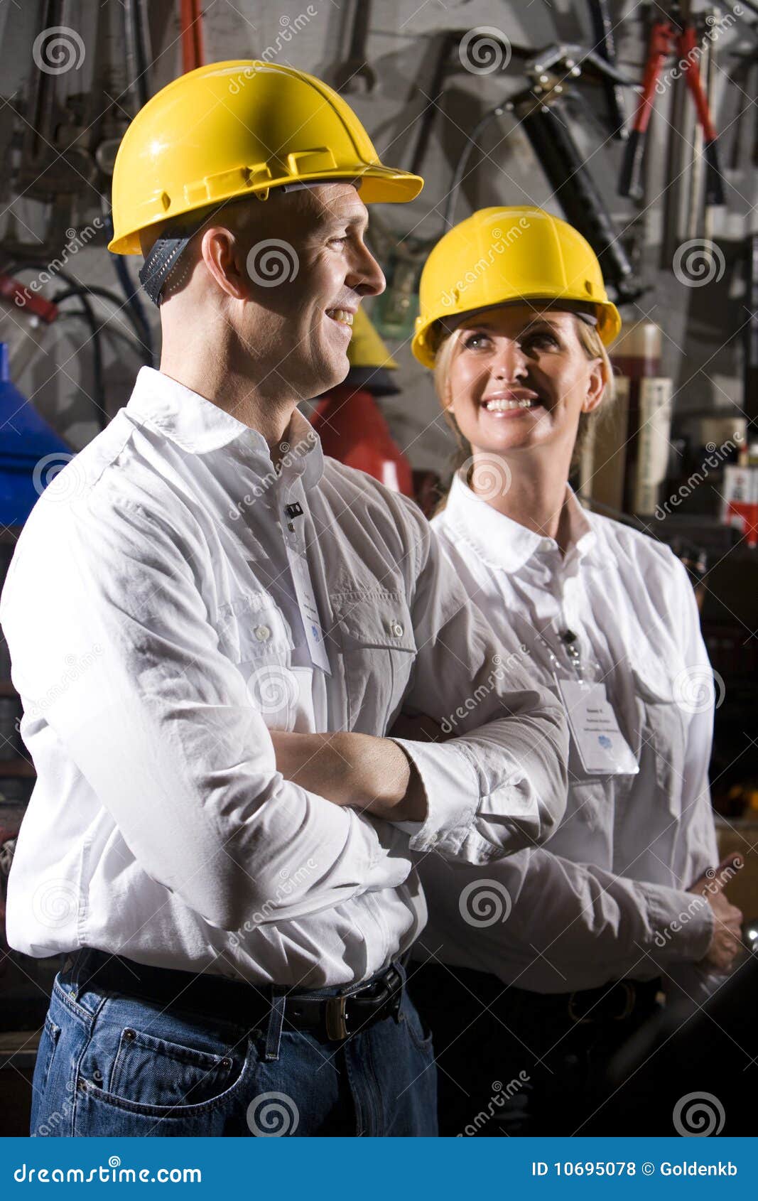 Workers with Hard Hats in Maintenance Room Stock Photo - Image of ...