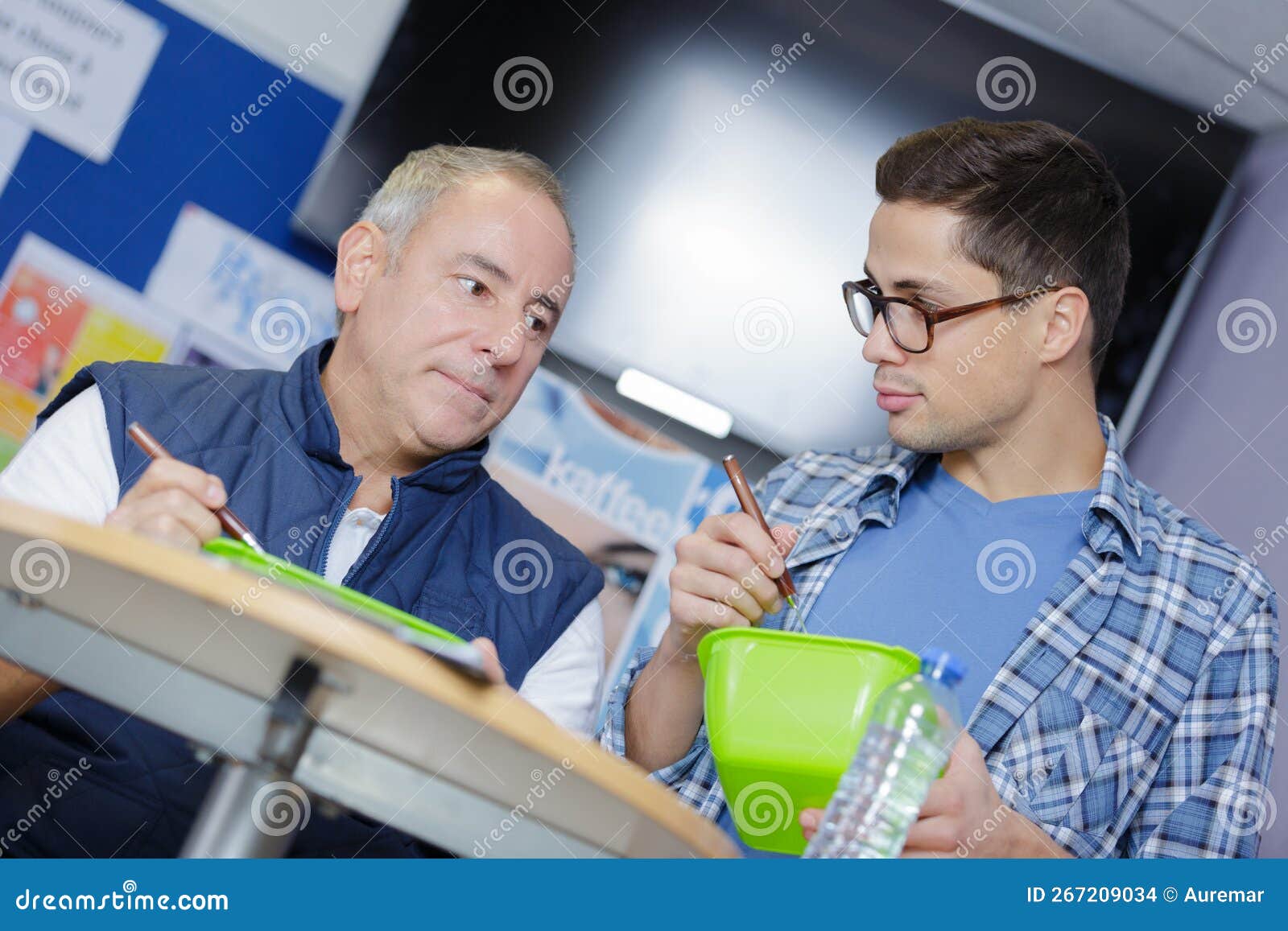 2 Workers Having Lunch Break Stock Photo - Image of lunchbreak, eating ...