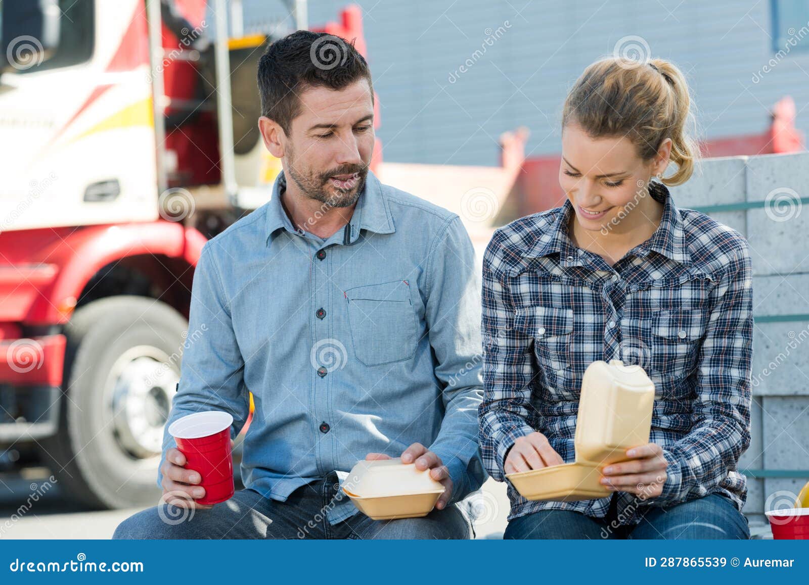 Workers having lunch break stock image. Image of food - 287865539