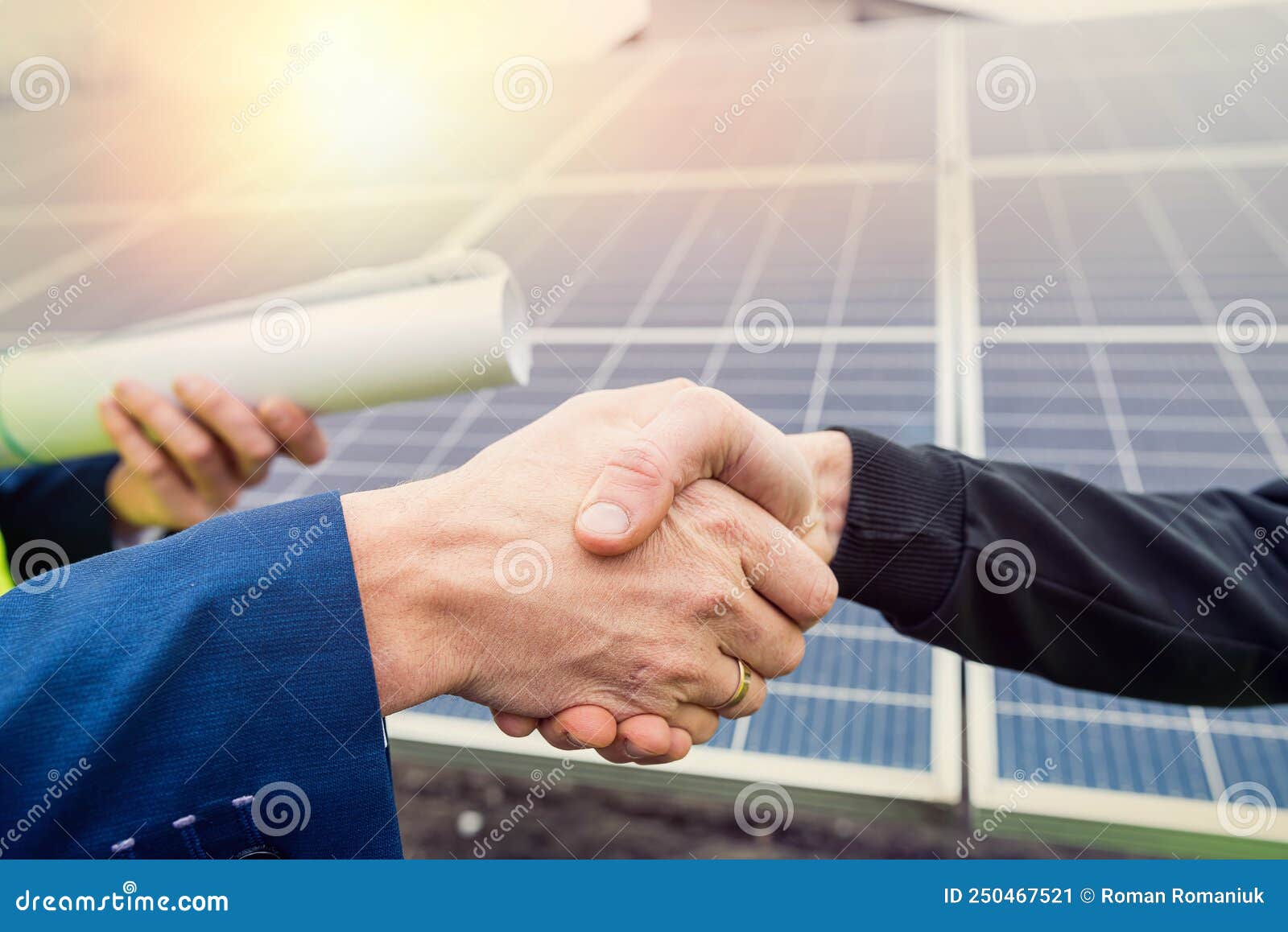 Workers in Helmets Two Men Shake Hands after Working on the ...
