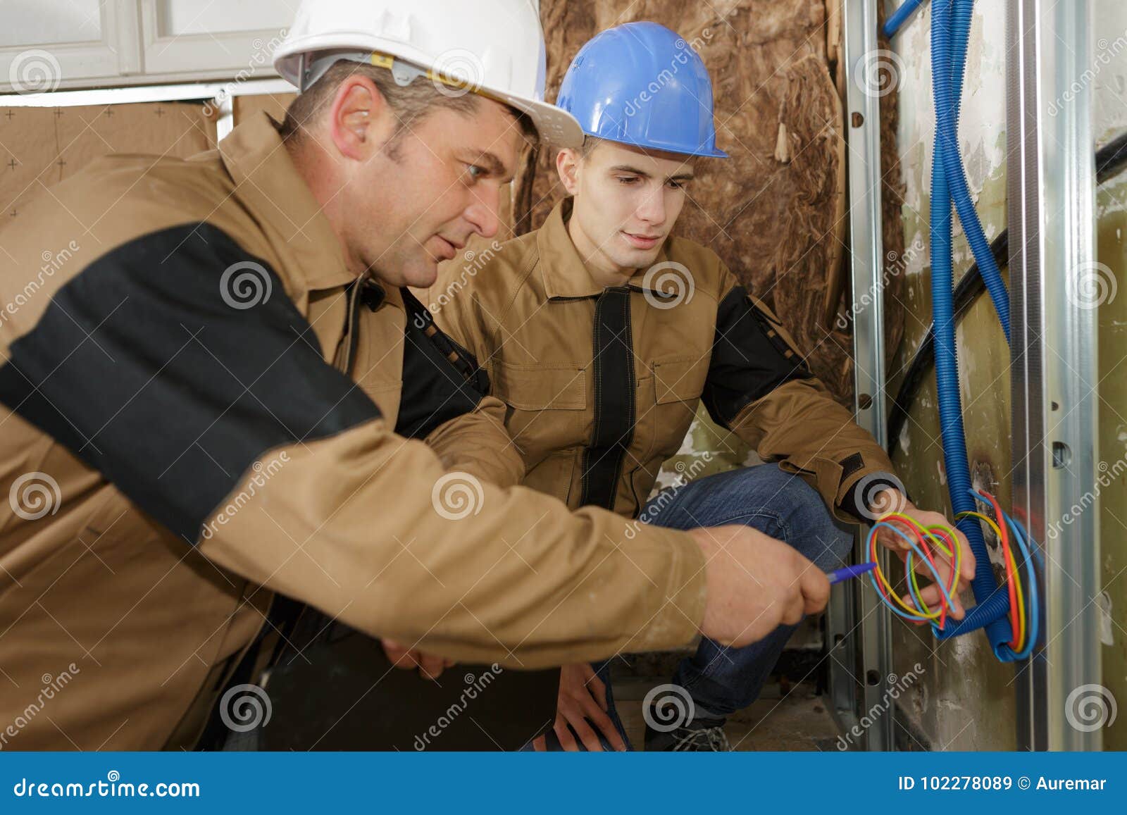 Workers at Indoors Wall Insulation Works Stock Image - Image of laborer ...