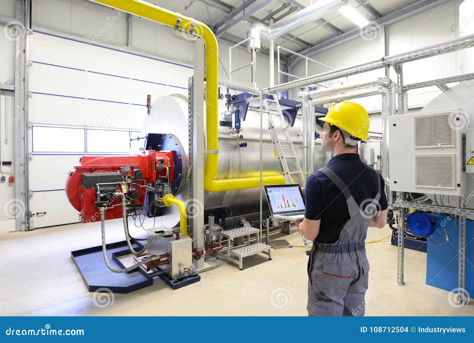 Workers in an Industrial Plant Check the Systems with Modern Technology ...
