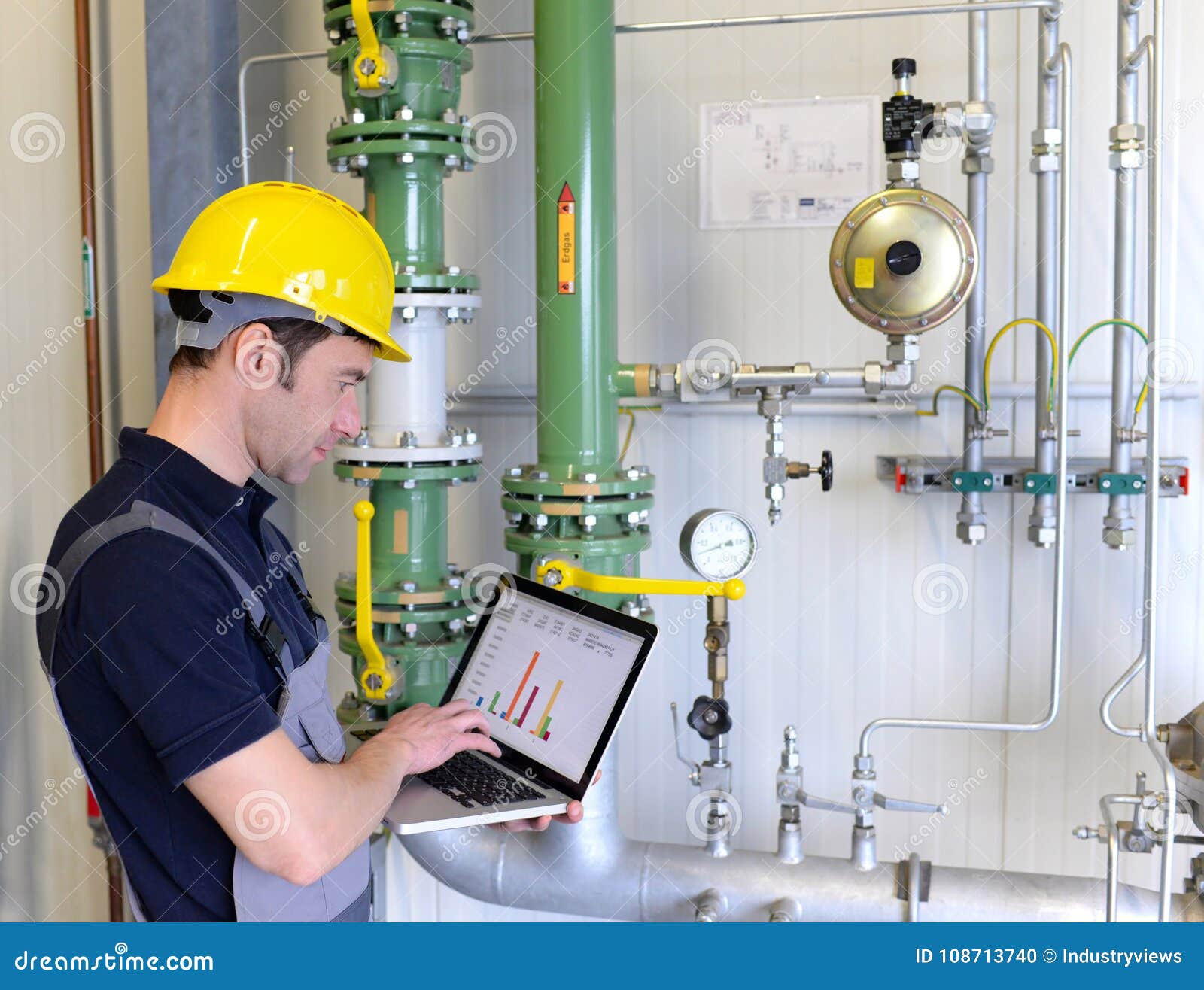 Workers in an Industrial Plant Check the Systems with Modern Technology ...