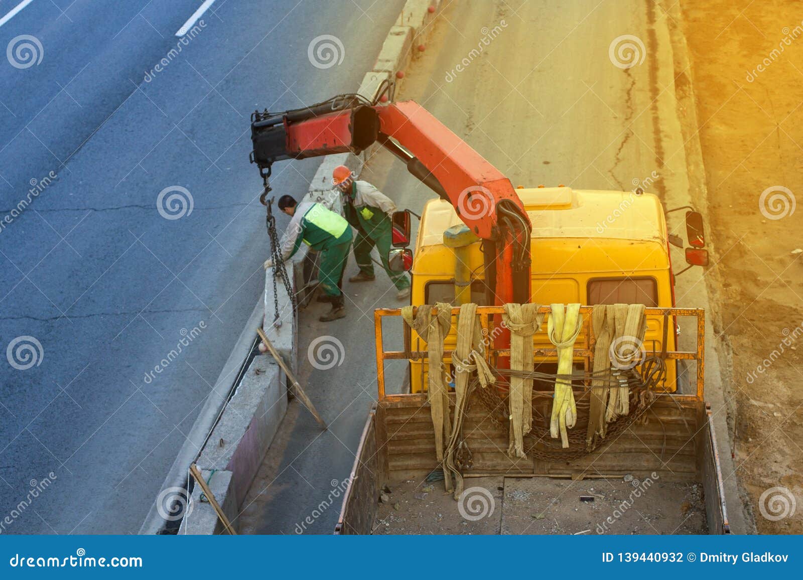 Workers Install Concrete Fence Along the Road Editorial Photography ...